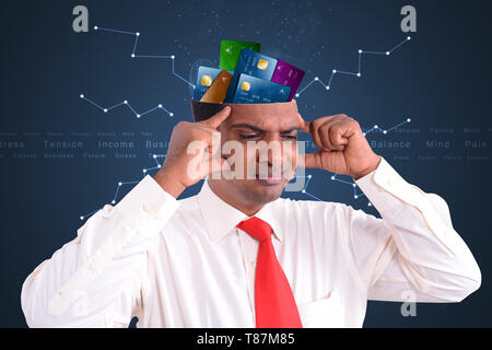 Man head fill with debit cards Stock Photo - Alamy