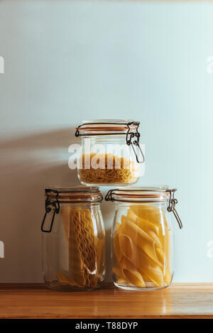 Uncooked lasagna pasta on blue background food and drink concept Stock ...