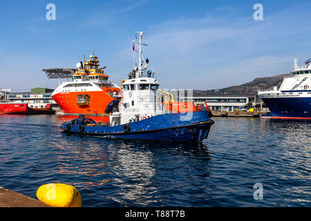 Tug boat Tronds Max arriving in the port of Bergen, Norway Stock Photo - Alamy