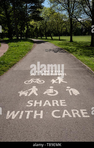 Share with care, bilingual English Welsh shared use path sign, cyclists ...