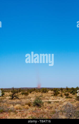 Sand landspout whirlwind sand tornado dust devil in Australian dessert ...