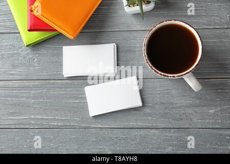 Blank notebooks and business cards on grey background Stock Photo - Alamy