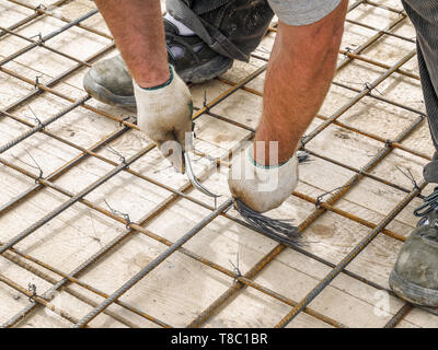 Closeup shot of steel bar reinforcement used for reinforcing concrete ...