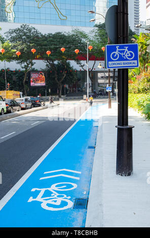 bicycle path marking on the street with pictogram of a bike bicycle ...