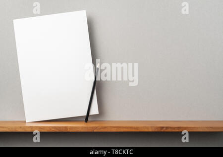 Design concept - front view of A4 hard paper stand on bookshelf and ...