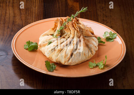 Khurjin a traditional Armenian Cuisine. Roasted lamb and vegetables ...