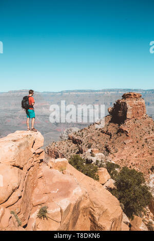 A beautiful view of a river flowing over rocks through the woods Stock ...