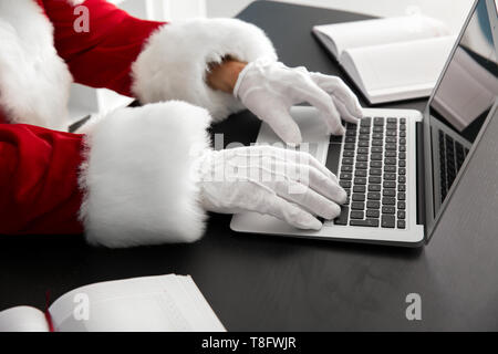 Santa Claus working with laptop Closeup Portrait Isolated on White ...