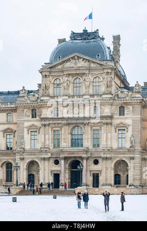 Louvre museum under snow, Paris, France Stock Photo - Alamy
