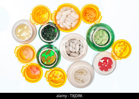 Light blue pills close up triangle macro photography drug on white ...