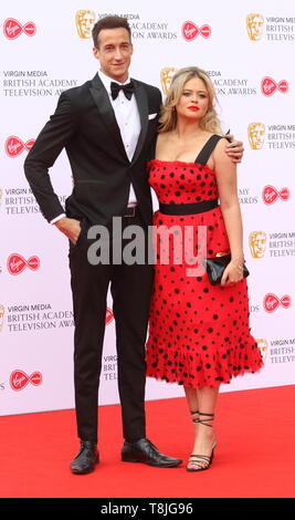 Emily Atack with a guest are seen on the red carpet during the Virgin ...