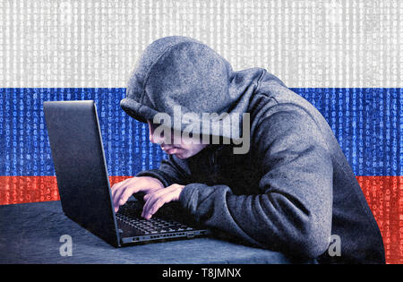 Russian hooded computer hacker Stock Photo - Alamy