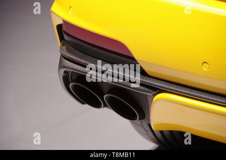Yellow car body carbon fiber detail Stock Photo - Alamy