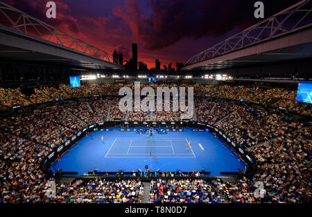 Rod Laver Arena at sunset with Melbourne's iconic skyline in the ...