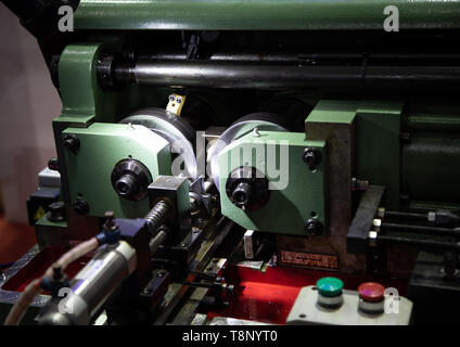 Hydraulic thread rolling machine for industrial metalwork Stock Photo ...