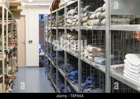 Prison clothing storage Stock Photo - Alamy