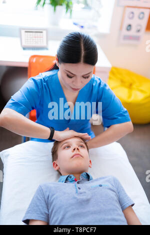 Pleasant head massage Stock Photo - Alamy