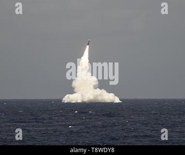 An unarmed Trident II D5 missile launches from USS Nevada Stock Photo ...