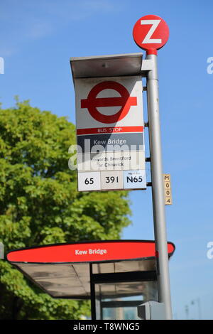 Bus Stop Sign with TFL (Travel for London) Logo Stock Photo - Alamy