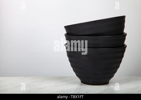 empty dishes on the marble table, copy space Stock Photo - Alamy