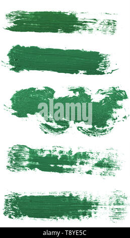 Green paint smear isolated on white background. Green spilled brush for ...