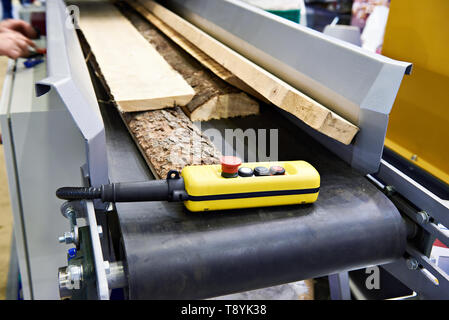 Remote control on a conveyor with boards in a wooden factory Stock ...