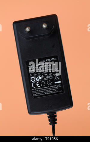 Power input and output details on electronic devices Stock Photo - Alamy