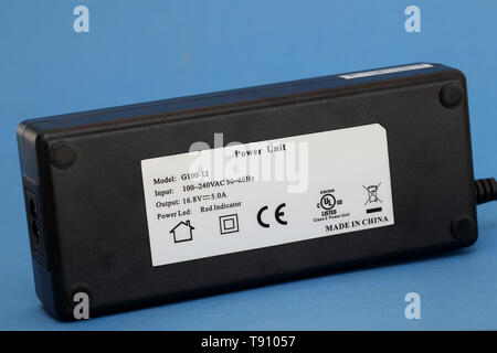 Power input and output details on electronic devices Stock Photo - Alamy