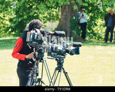 JUMIEGES, FRANCE - April circa, 2019. Unidentified two camera men for ...