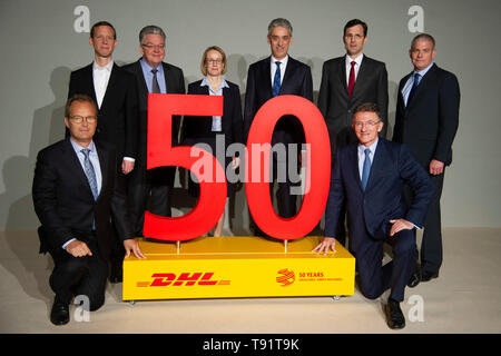 Left to right) Group Finance Director Mark Rennison, Tanaiste Mary ...