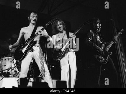 Steve Marriott, Dave "Clem" Clempson and Greg Ridley of Humble Pie ...