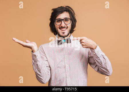 Portrait of cheerful optimistic clever guy wear orange shirt under ...