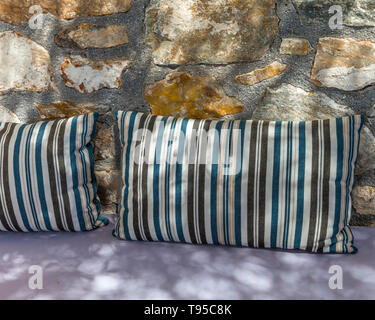 Closeup of pillows on modern comfortable orthopedic mattress on display ...