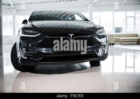 Tesla New-generation Electric Car of Dark Brown Indoor Stock Photo - Alamy