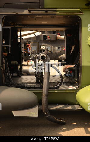 Machine gun M134 mounted on a Huey Helicopter, War Remnants Museum ...