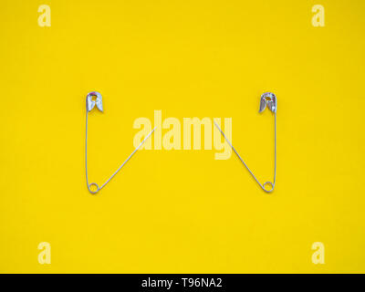Lots of safety pins. Team concept Stock Photo - Alamy