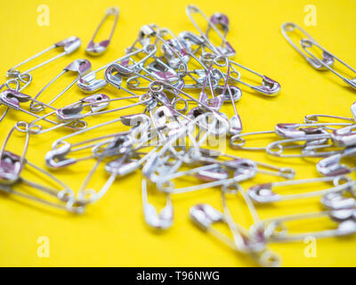 Lots of safety pins. Team concept Stock Photo - Alamy