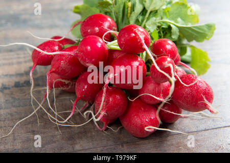 delicious radishes oranic brunch on a rustic table Stock Photo - Alamy