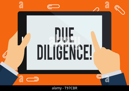 Hand of Businessman holding DUE DILIGENCE inscription, business success ...