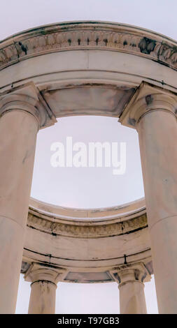 Close up of smooth columns with a circular structure on top on a sunny ...