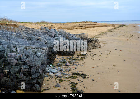 Rock armour sea defences on the Norfolk coast at Happisburgh, Norfolk ...