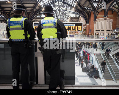 British transport police officer on tube train underground Stock Photo ...