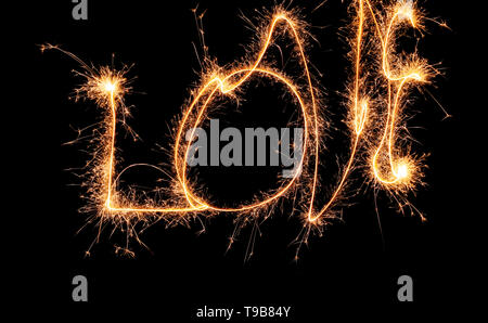 Sparklers forming the word love Stock Photo - Alamy