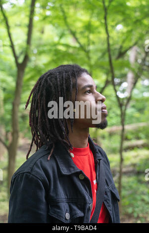 Cool African American man with dreadlocks wearing sunglasses with ...