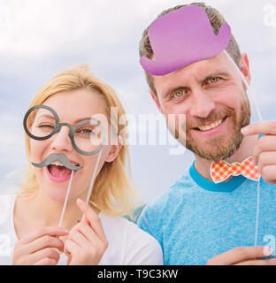 happy couple with party props having fun Stock Photo - Alamy