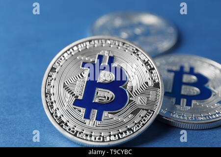Bitcoins on color background, closeup Stock Photo - Alamy