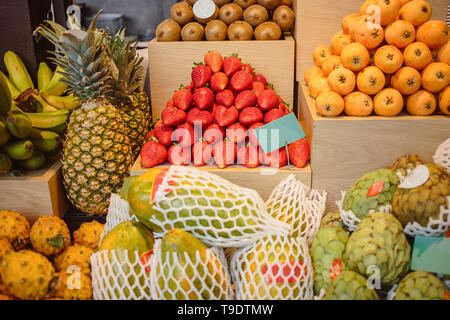 Persimmon on the counter shop Stock Photo - Alamy