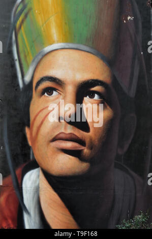 A huge mural in the Forcella neighborhood by artist Jorit Agoch. It ...