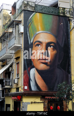 A huge mural in the Forcella neighborhood by artist Jorit Agoch. It ...