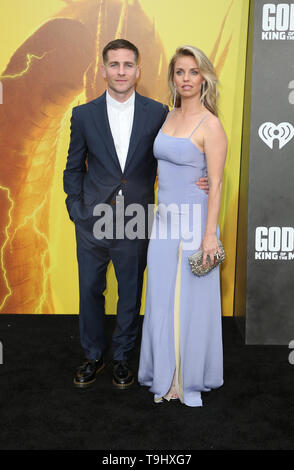 (L-R) Zach Shields and Kelli Garner at the "Godzilla: King of the ...